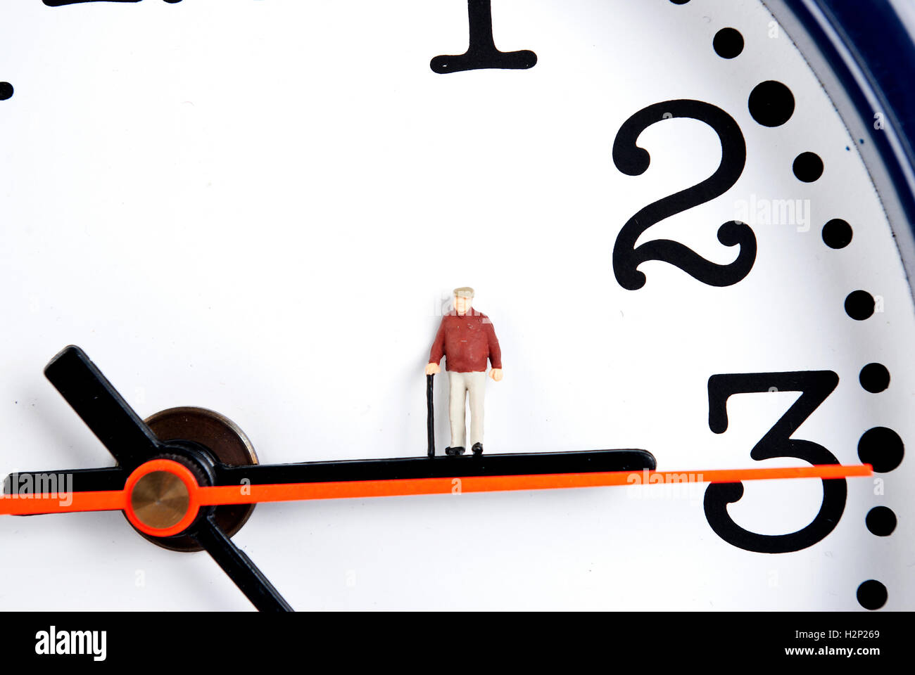 old man on clock in time Stock Photo - Alamy
