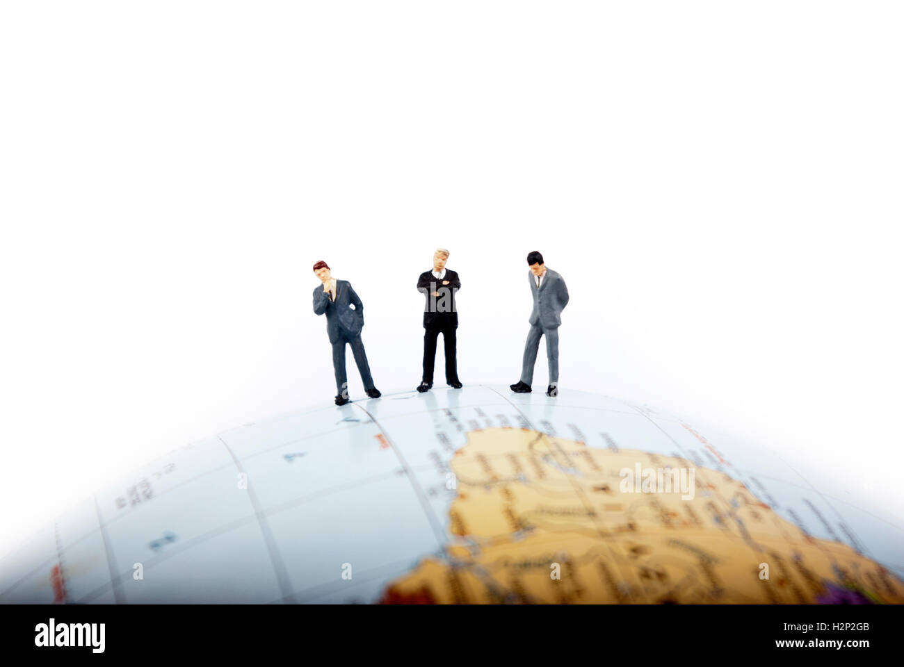 Business people walking on globe hi-res stock photography and images ...