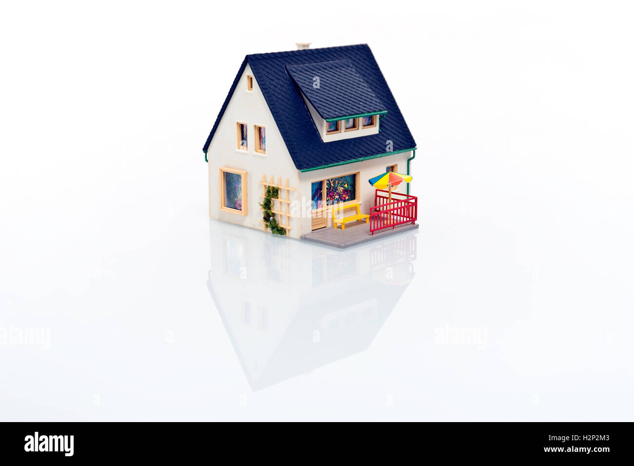 miniature house on white background Stock Photo - Alamy