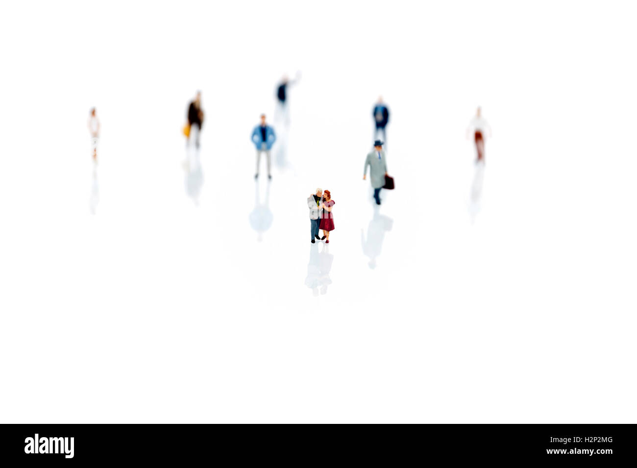 miniature people on white background Stock Photo - Alamy