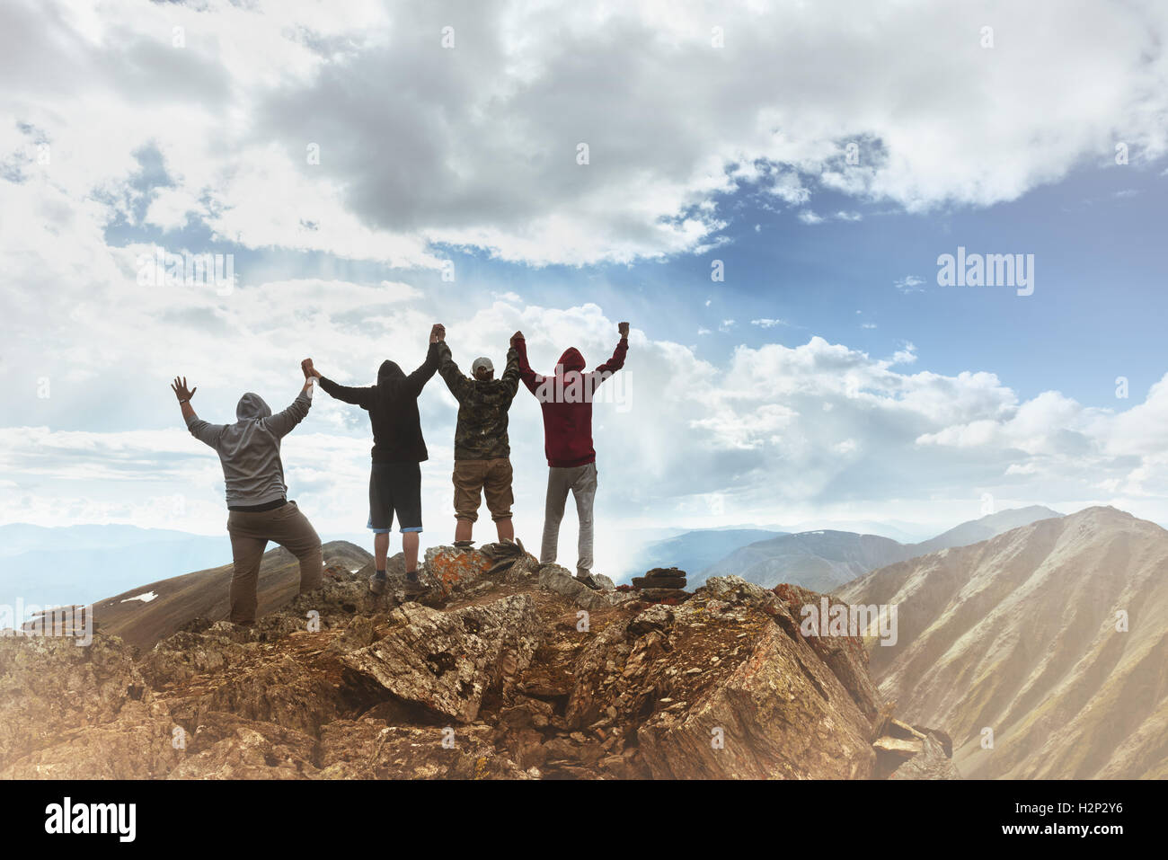 Group people winner win mountain concept Stock Photo - Alamy