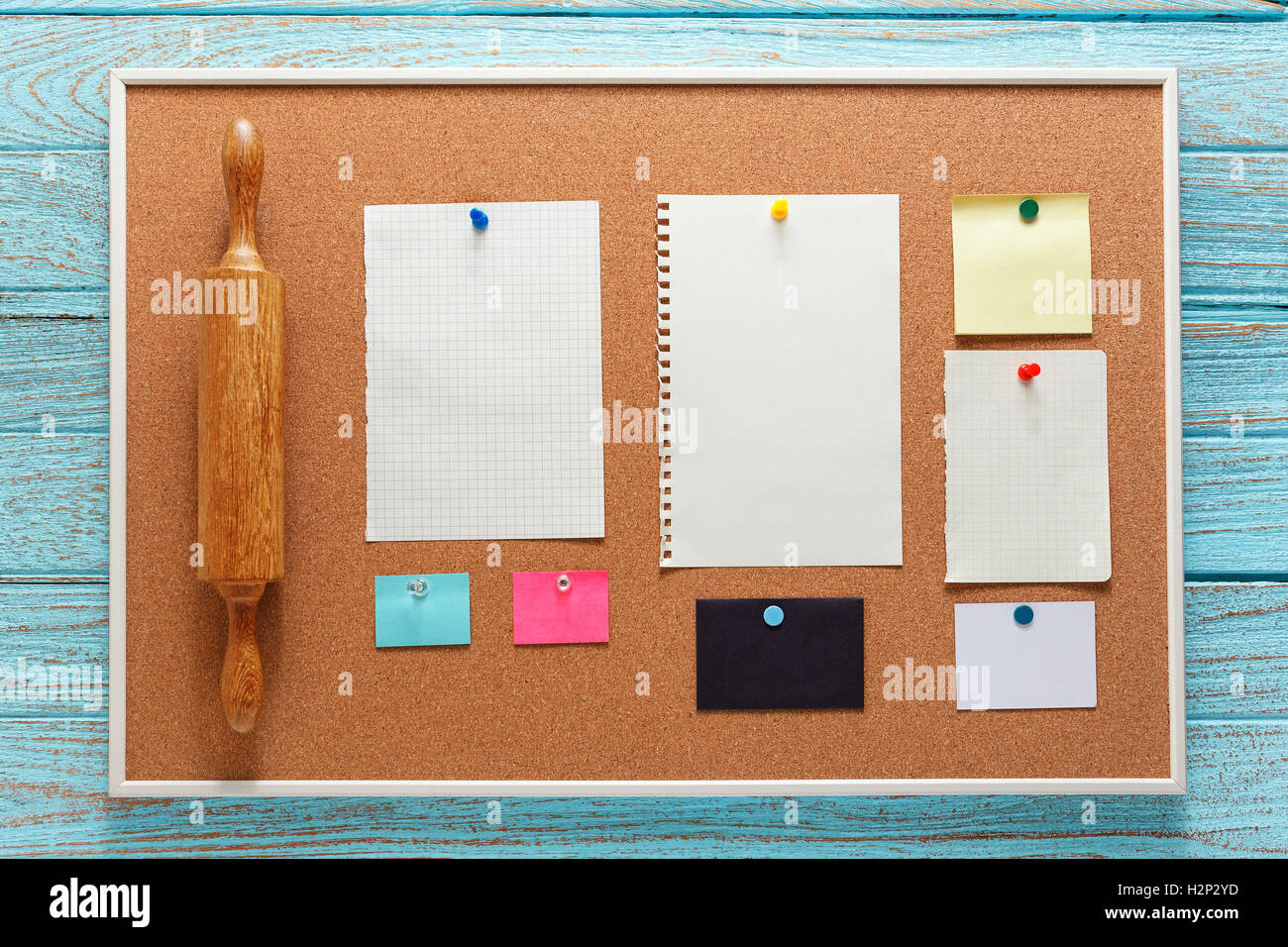Kitchen bulletin board with note paper and baking rolling pins isolated ...