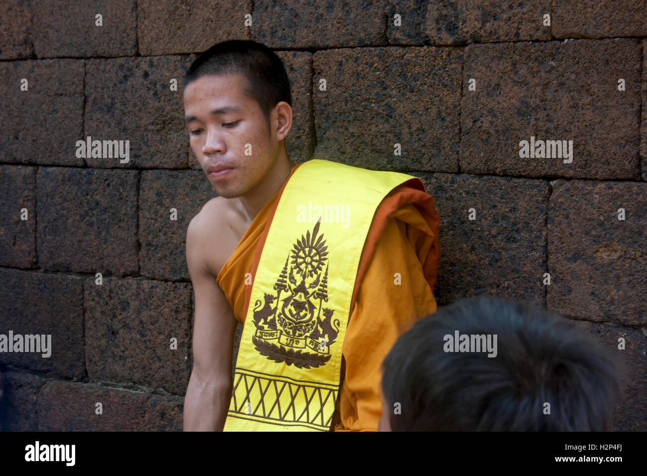 A Buddhist monk is conducting a ceremoney during the Pchum Ben holiday ...