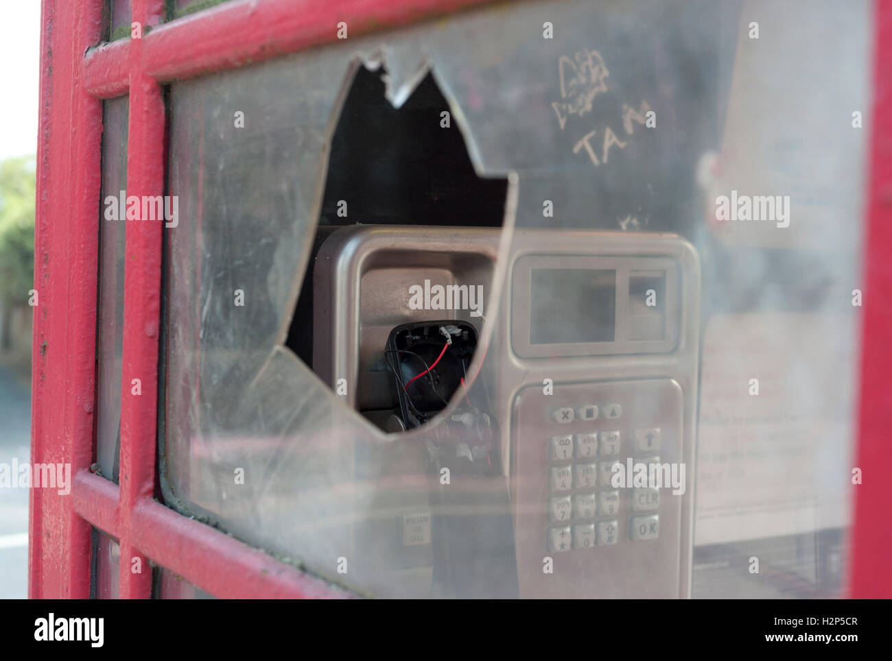 Vandalized phone box hi-res stock photography and images - Alamy