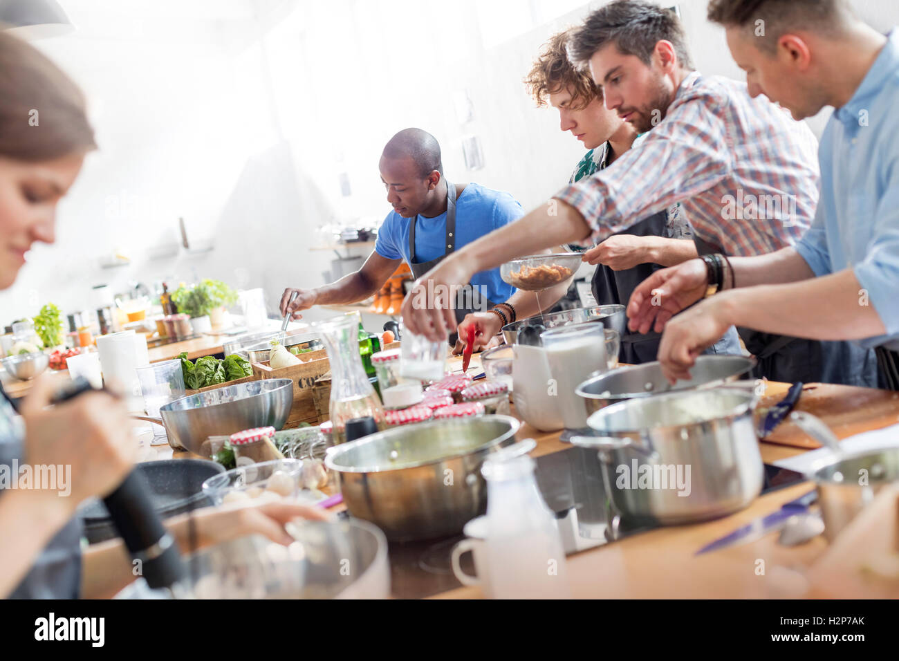 Male students in cooking class kitchen Stock Photo - Alamy