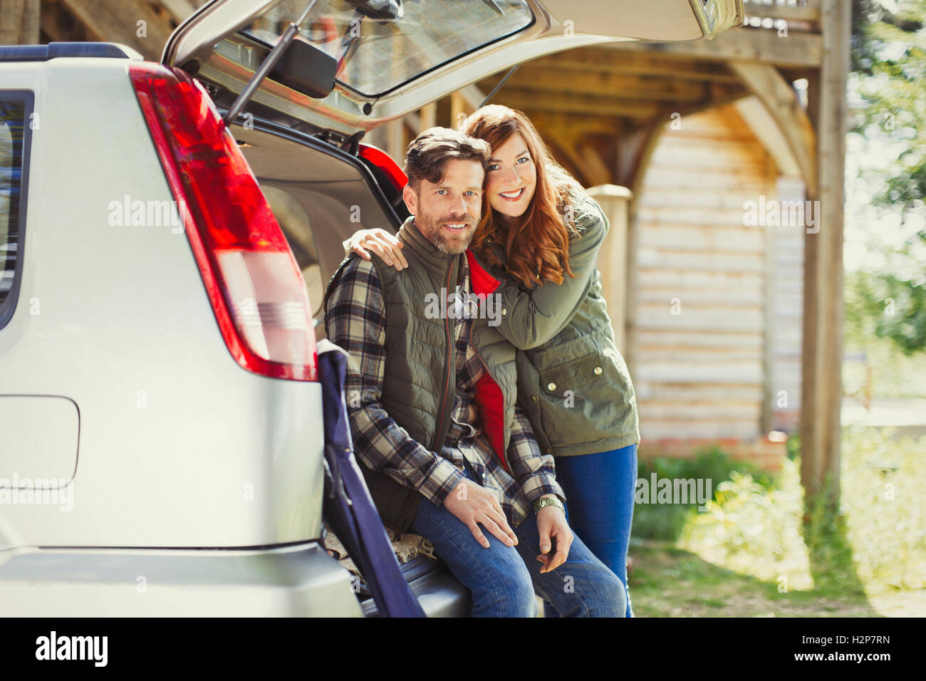 Couple standing outside house back hi-res stock photography and images ...