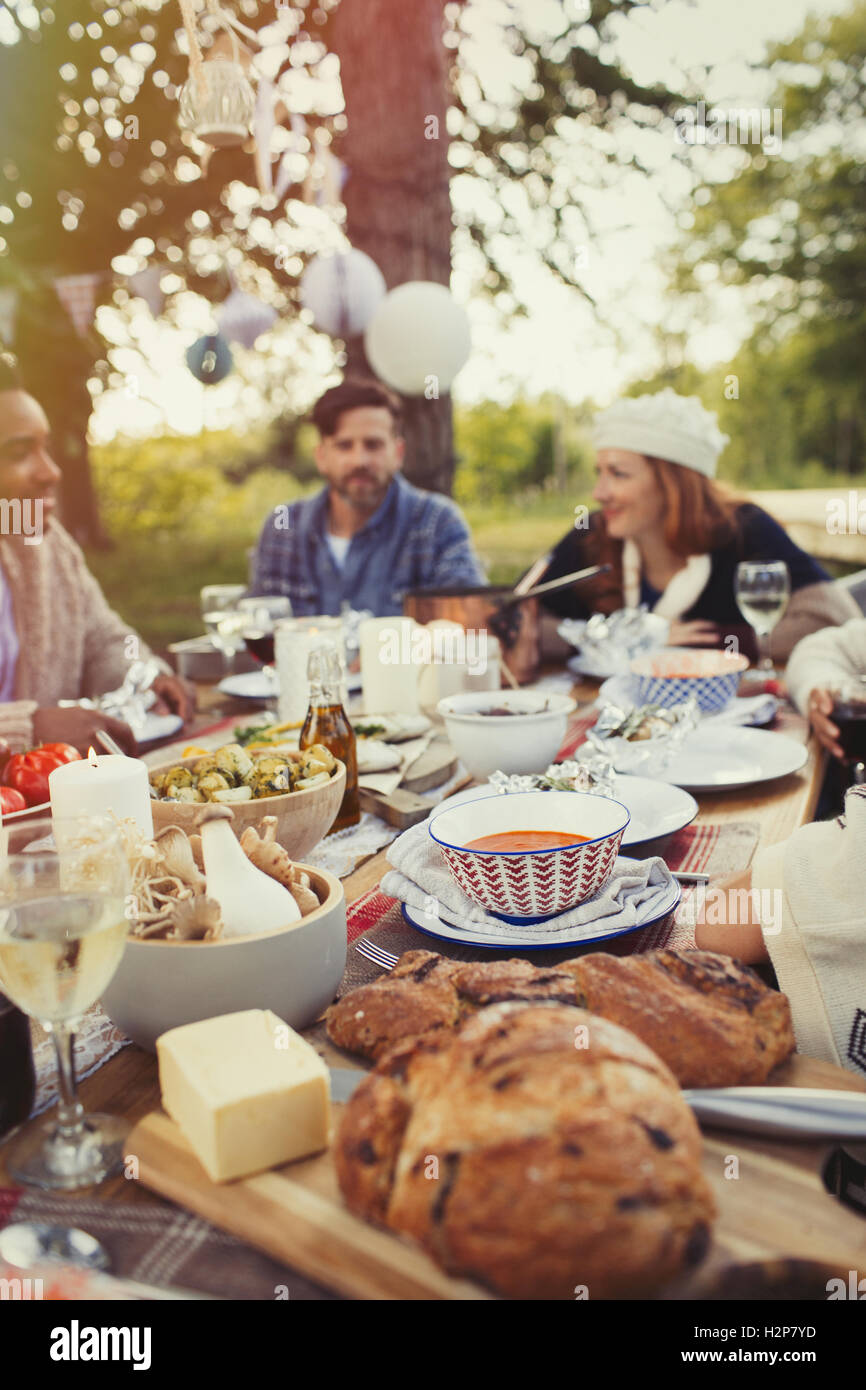 Group friends sitting table enjoying hi-res stock photography and ...