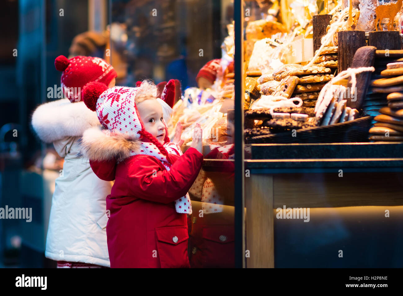 Children window shopping on traditional Christmas market in Germany on ...