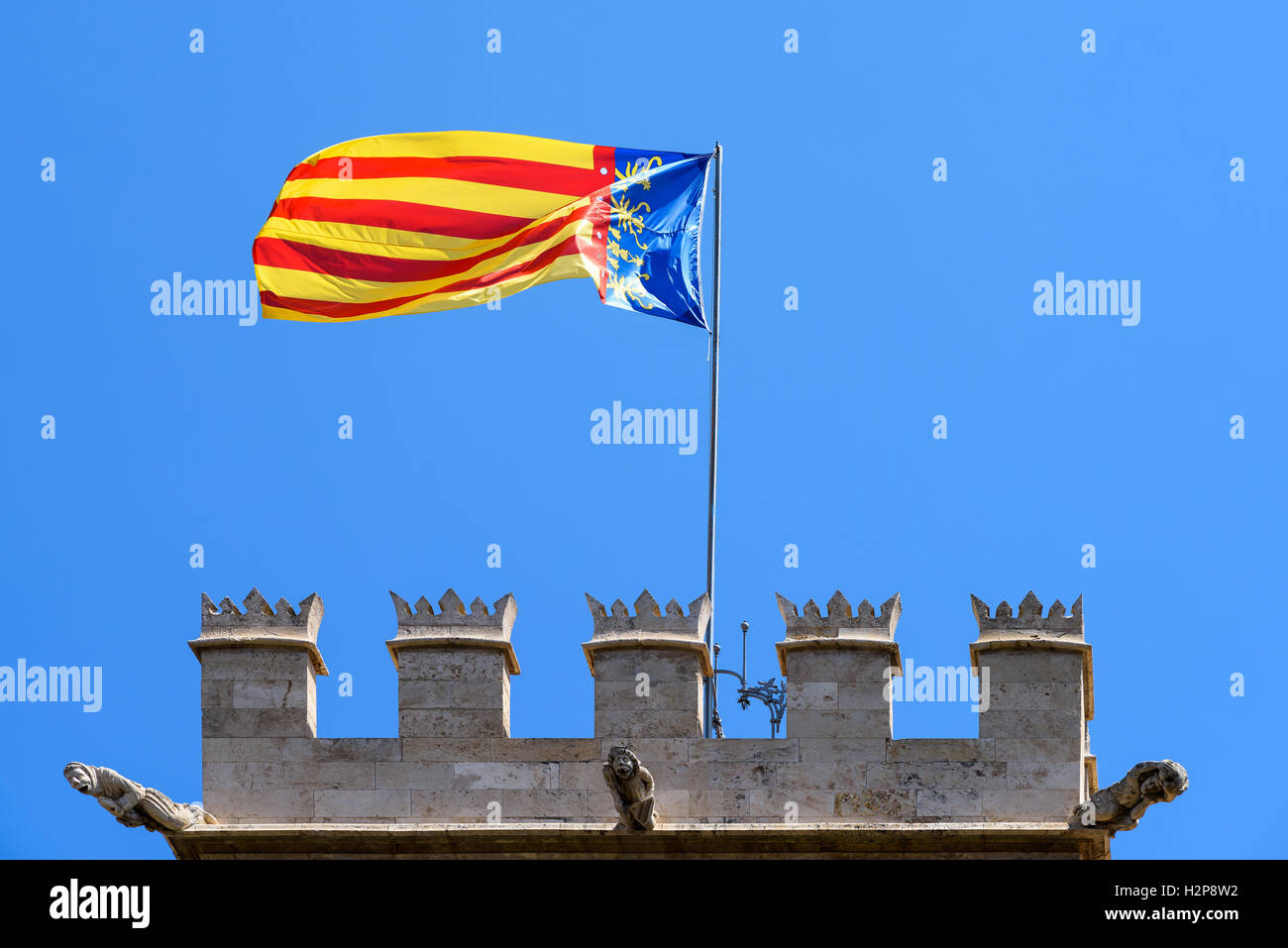 Valencia Flag On Old Tower Stock Photo - Alamy