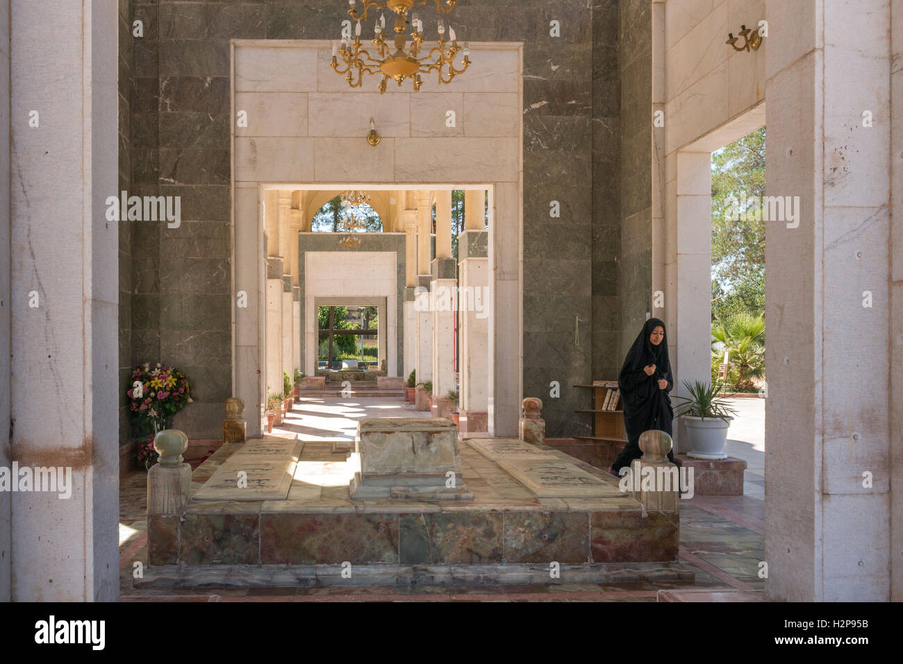 Kerman, Museum Of The Holy Defence, Woman Near Grave Stock Photo - Alamy