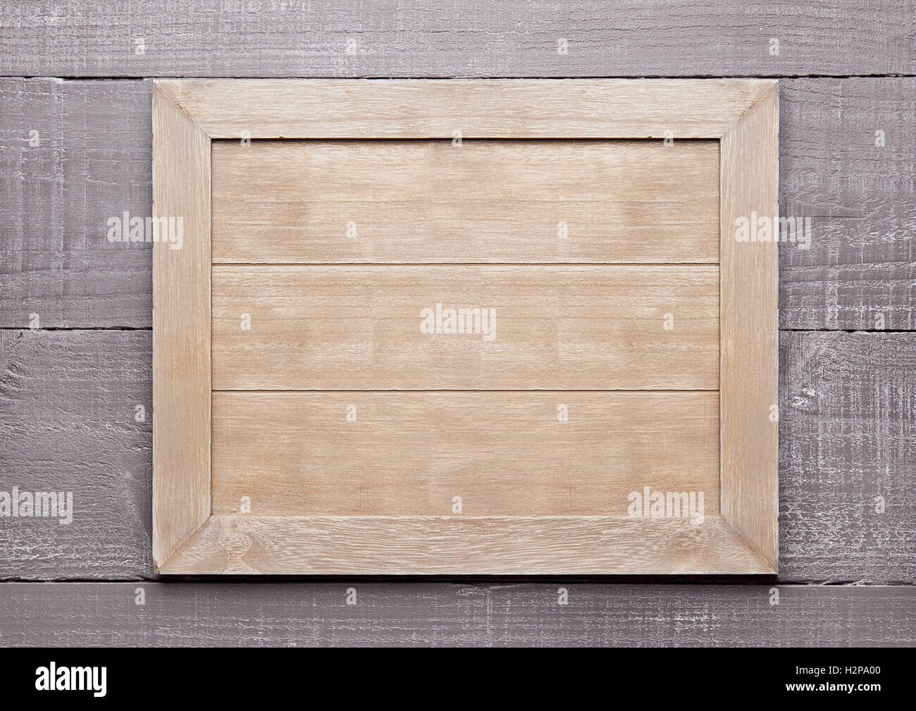 Wooden textured sign board for messages empty on wooden background ...