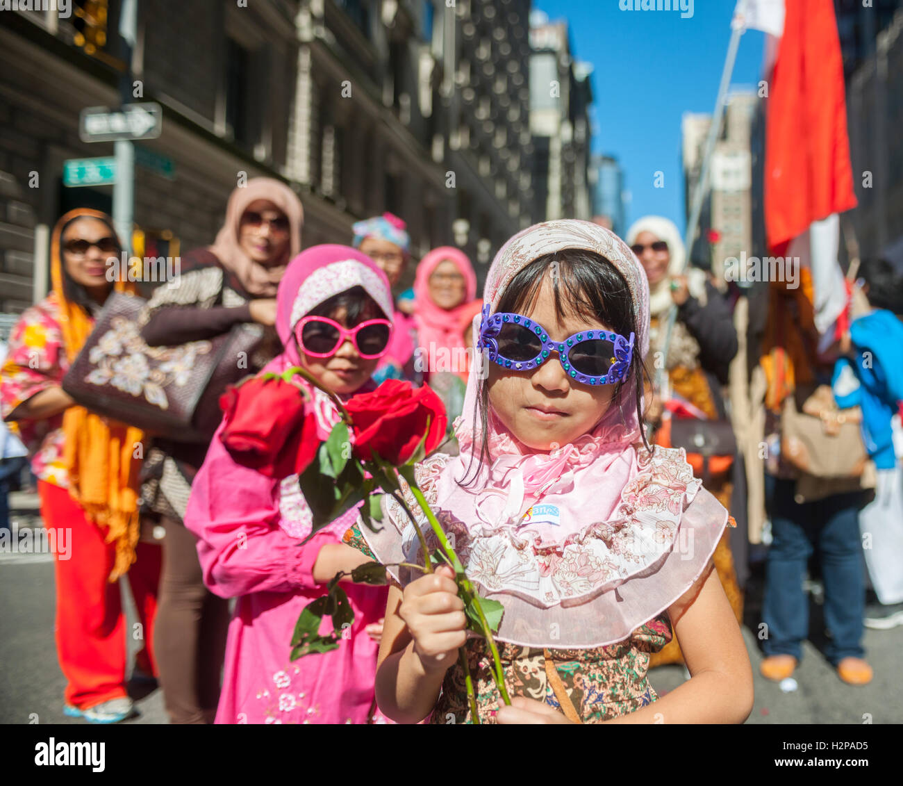 Muslims from the tri-state area gather on Madison Avenue in New York on ...