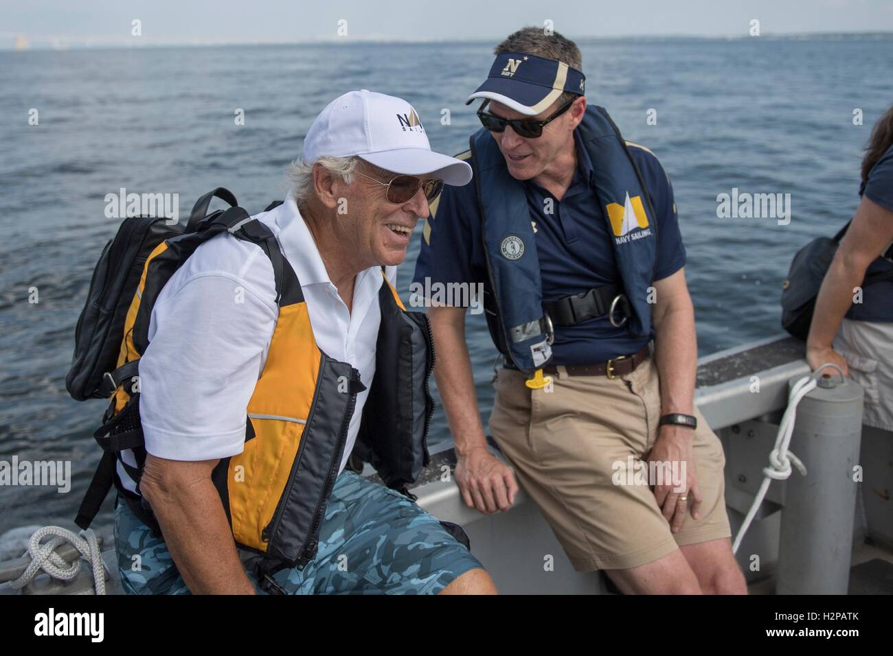 Singer Jimmy Buffett, left, with Navy offshore sailing head coach Jahn ...