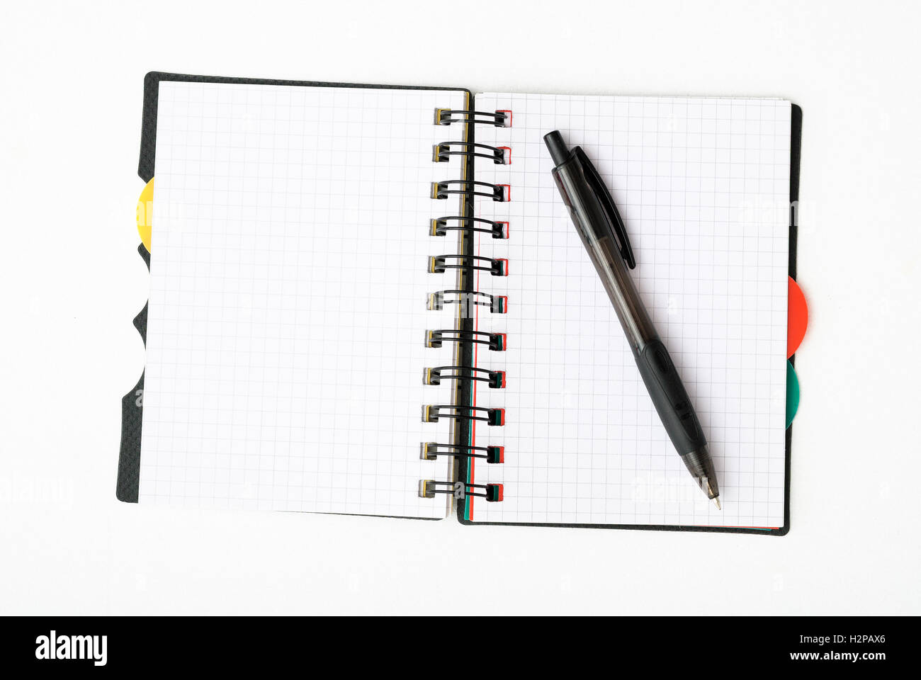 notepad with pen isolated Stock Photo - Alamy