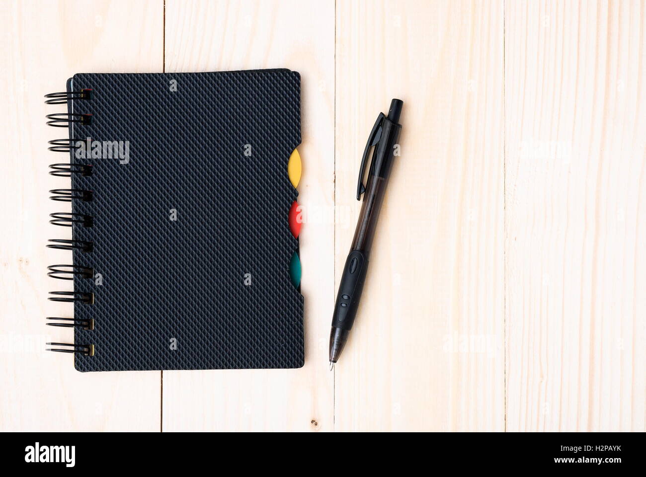 notepad with pen Stock Photo - Alamy