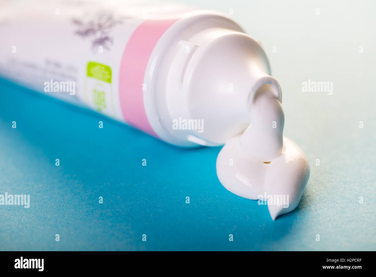 tube of toothpaste closeup on blue background Stock Photo - Alamy