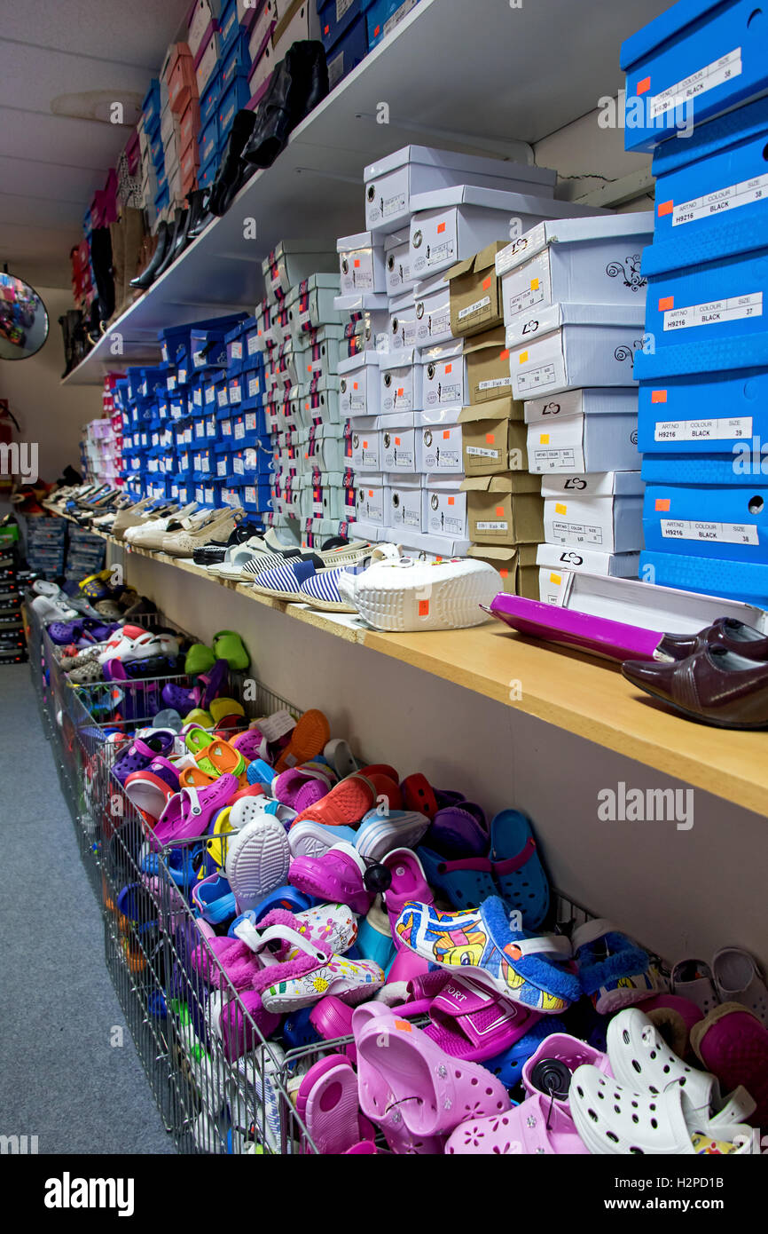 Slipper shelves hi-res stock photography and images - Alamy