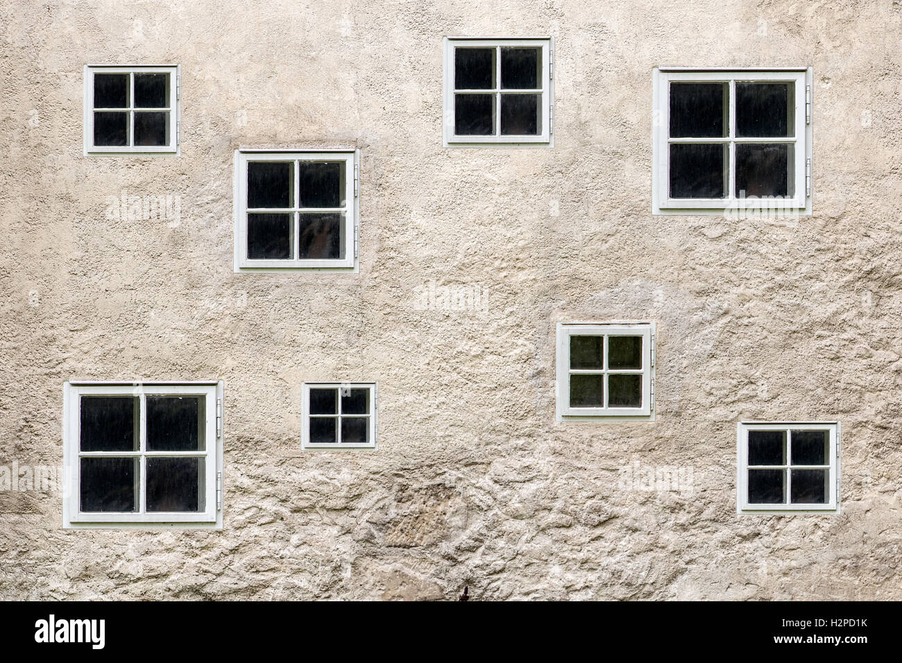 facade of an old building with small windows Stock Photo - Alamy
