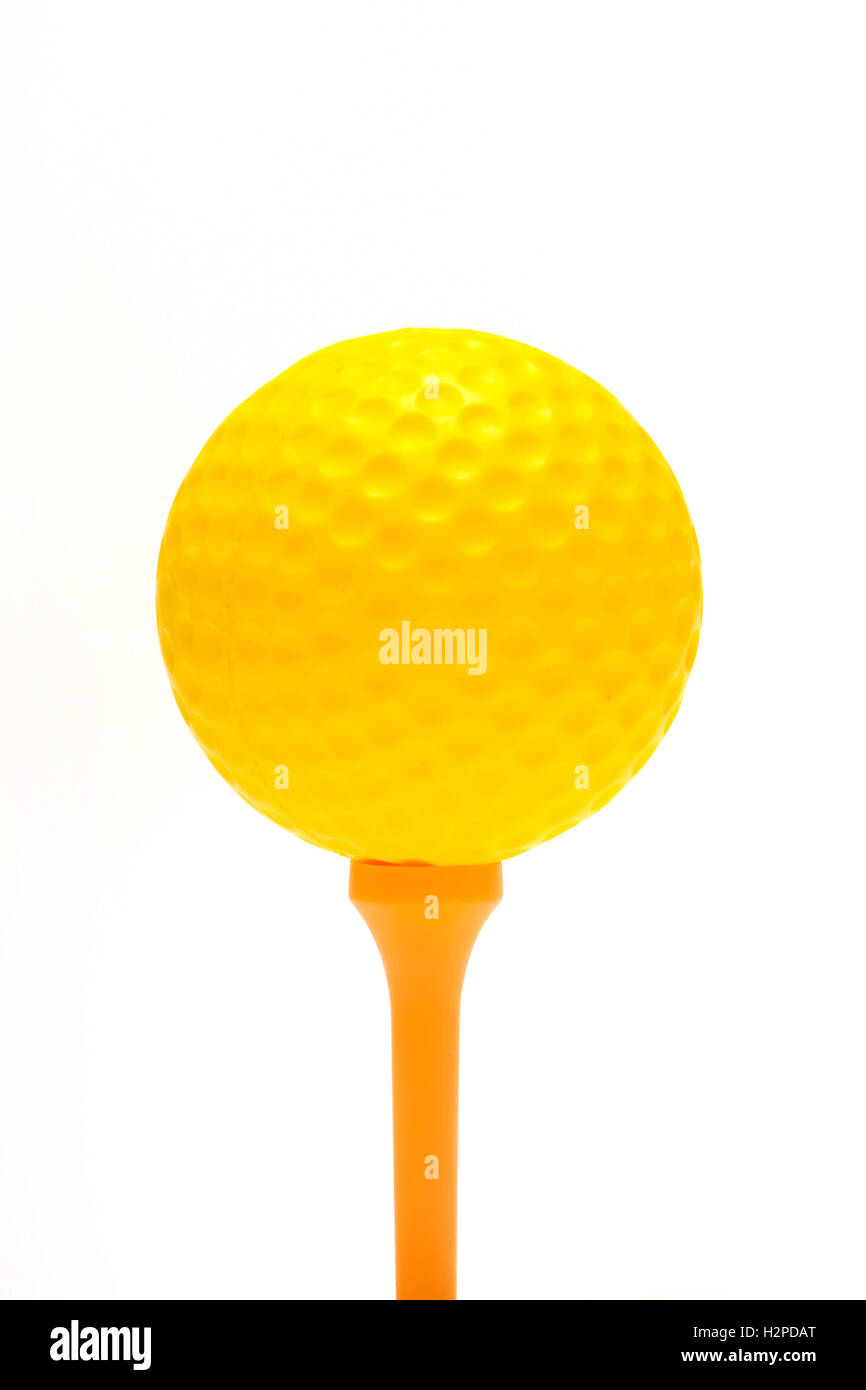 golf ball yellow Stock Photo - Alamy