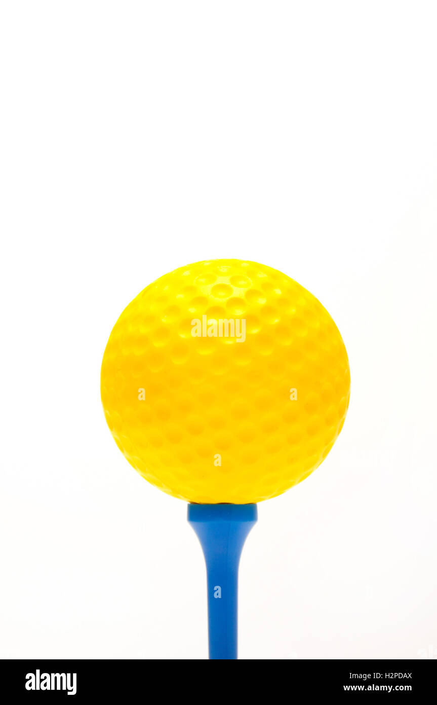 golf ball yellow Stock Photo - Alamy