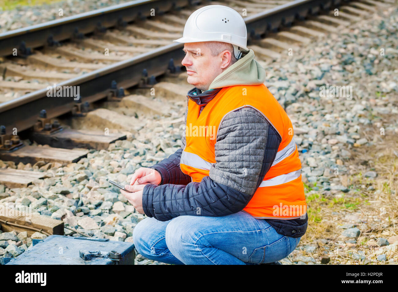 Railway Engineer working with tablet PC near railway Stock Photo - Alamy