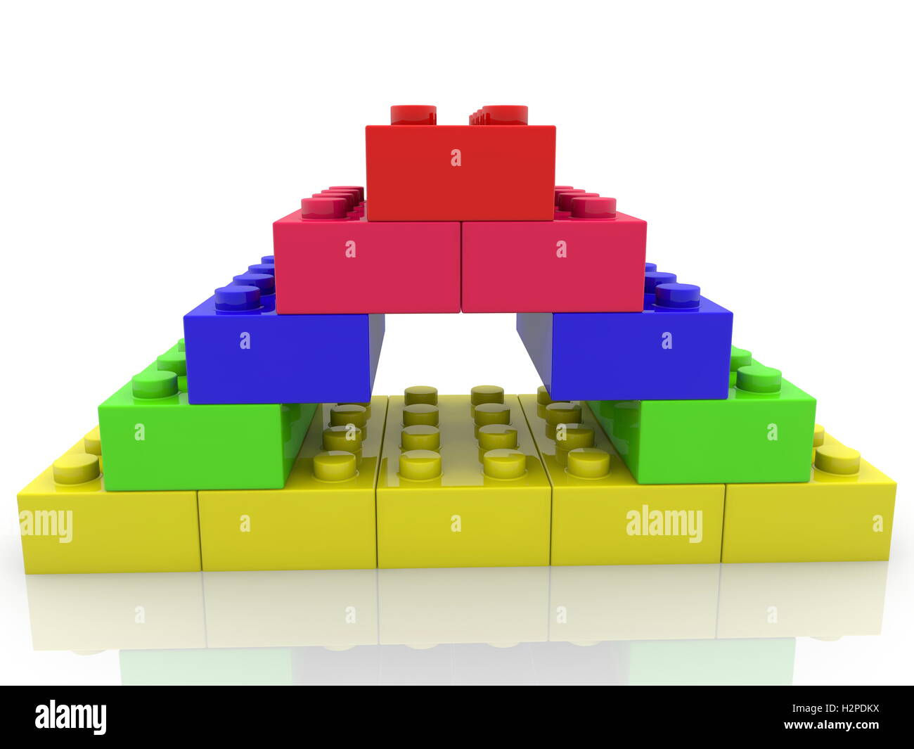 Toy bricks in various colors stacked in pyramid Stock Photo - Alamy
