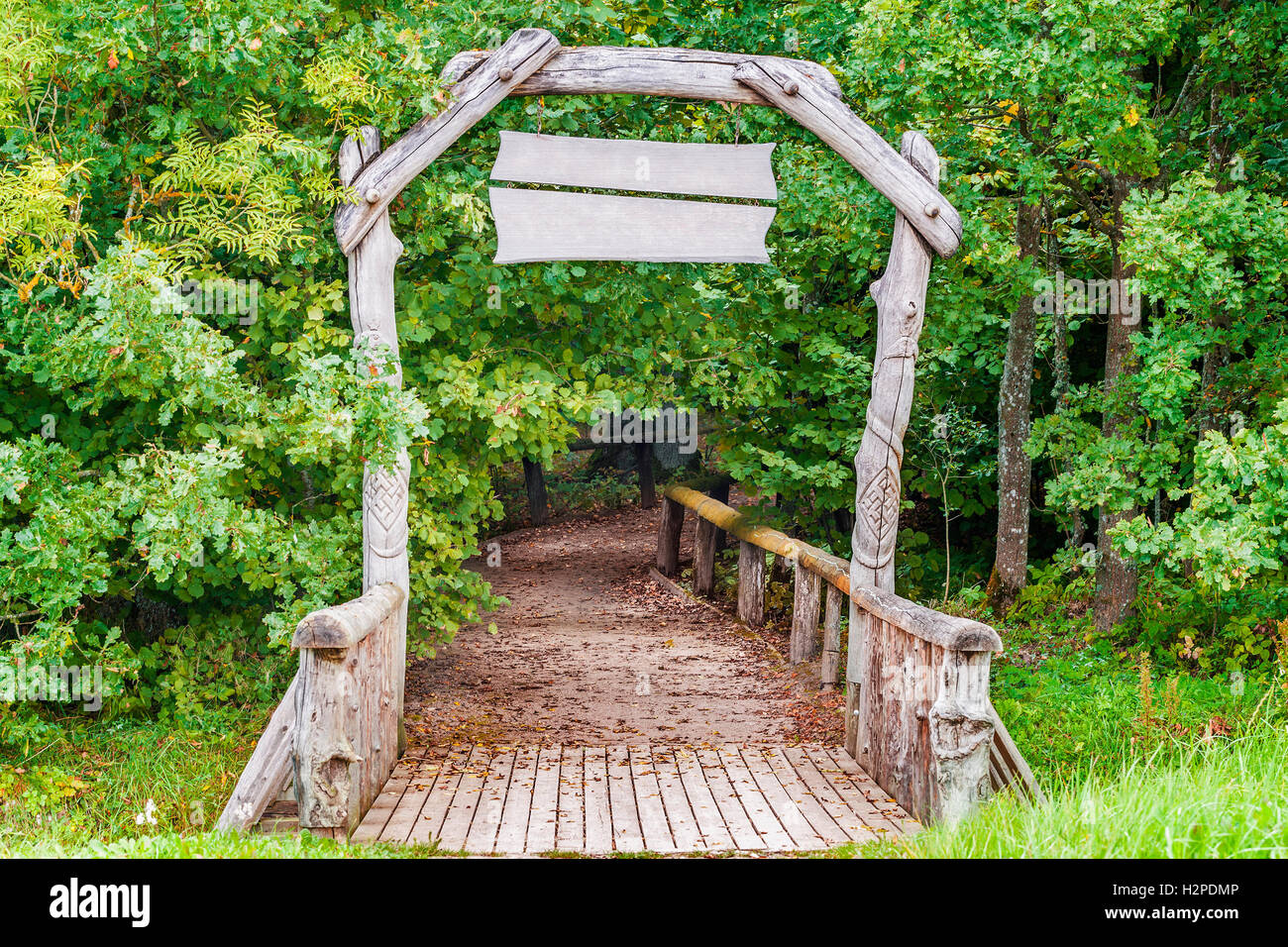 Wooden gate in park Stock Photo - Alamy