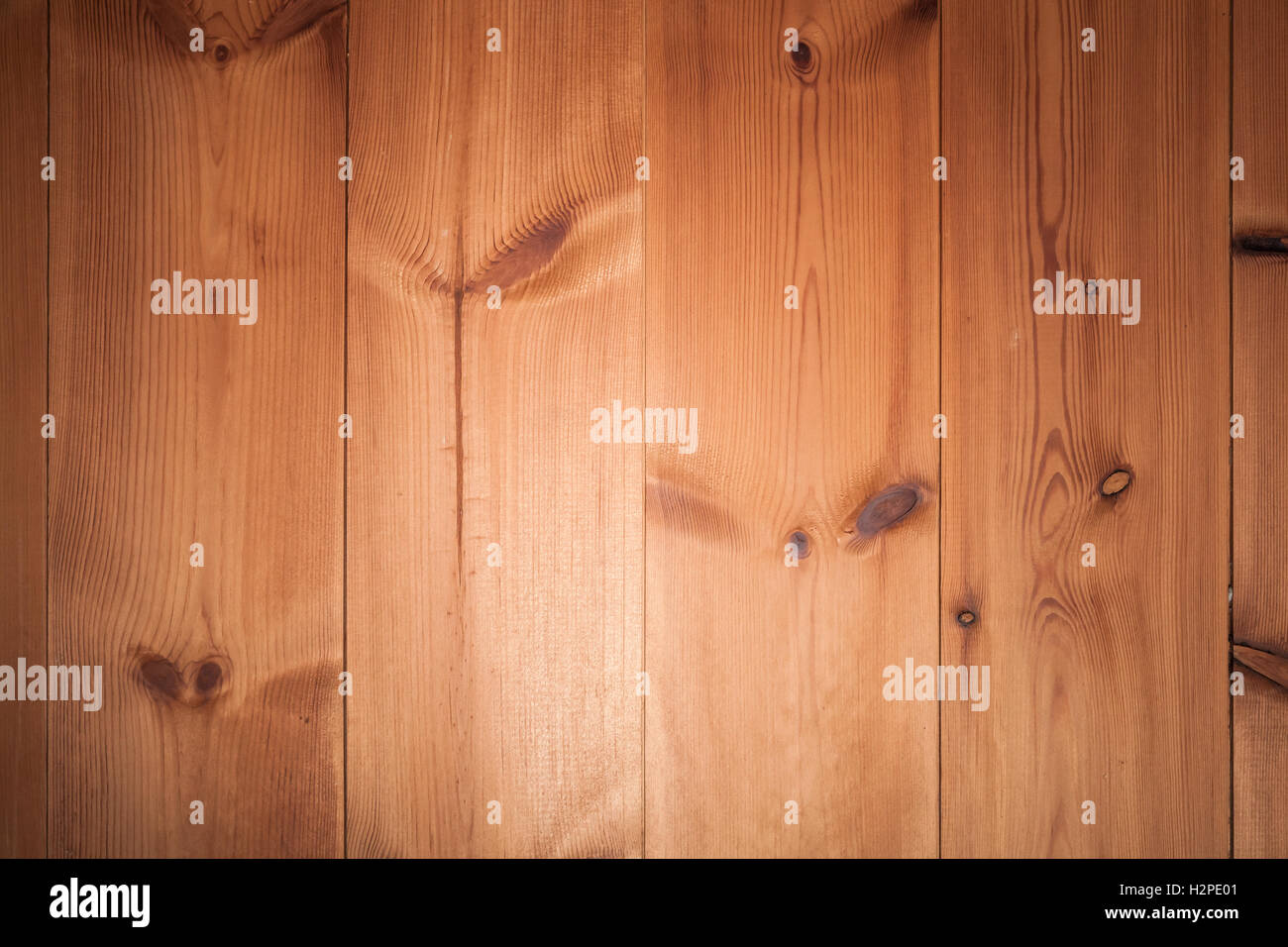 Background texture of wooden wall made of pine tree planks with central ...