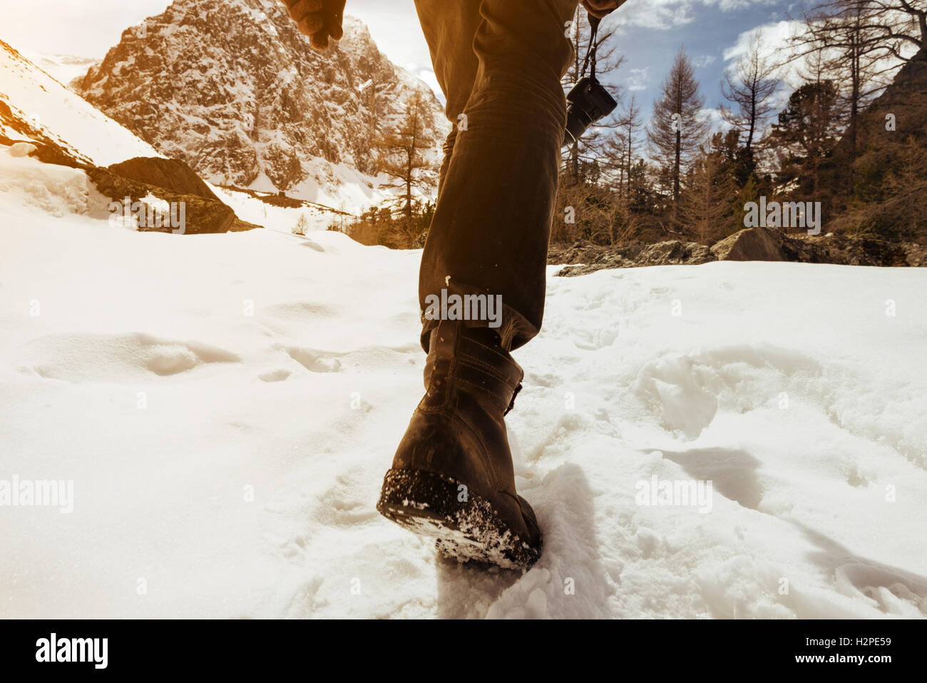 Closeup photo of human's legs going to the mountain Stock Photo - Alamy
