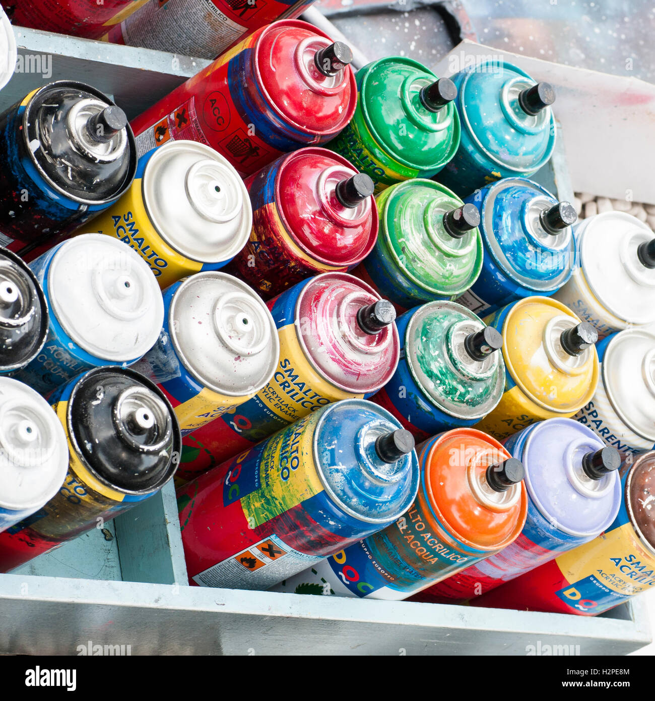 Street artist with spray cans Stock Photo - Alamy