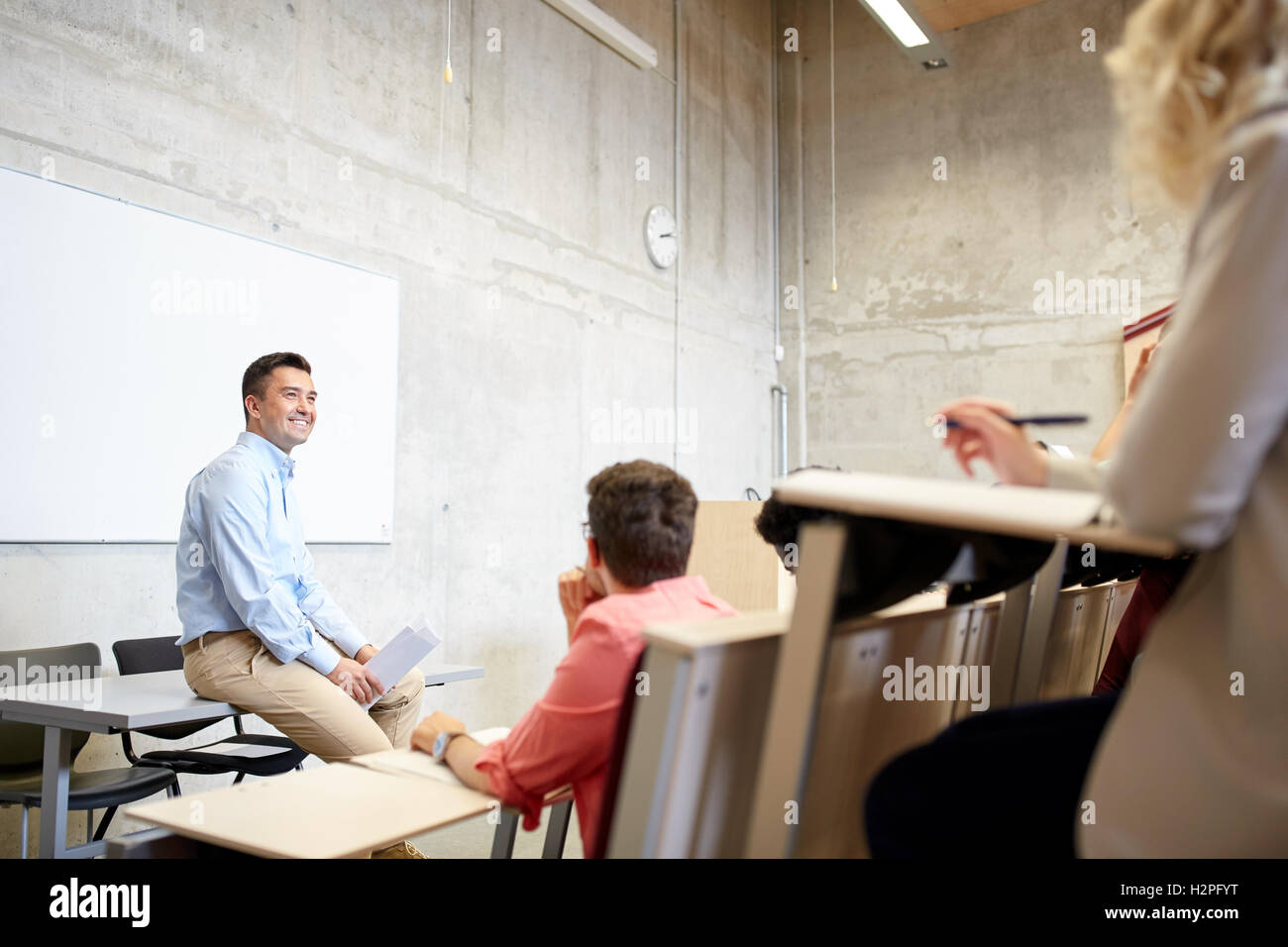 group of students and teacher at lecture Stock Photo - Alamy