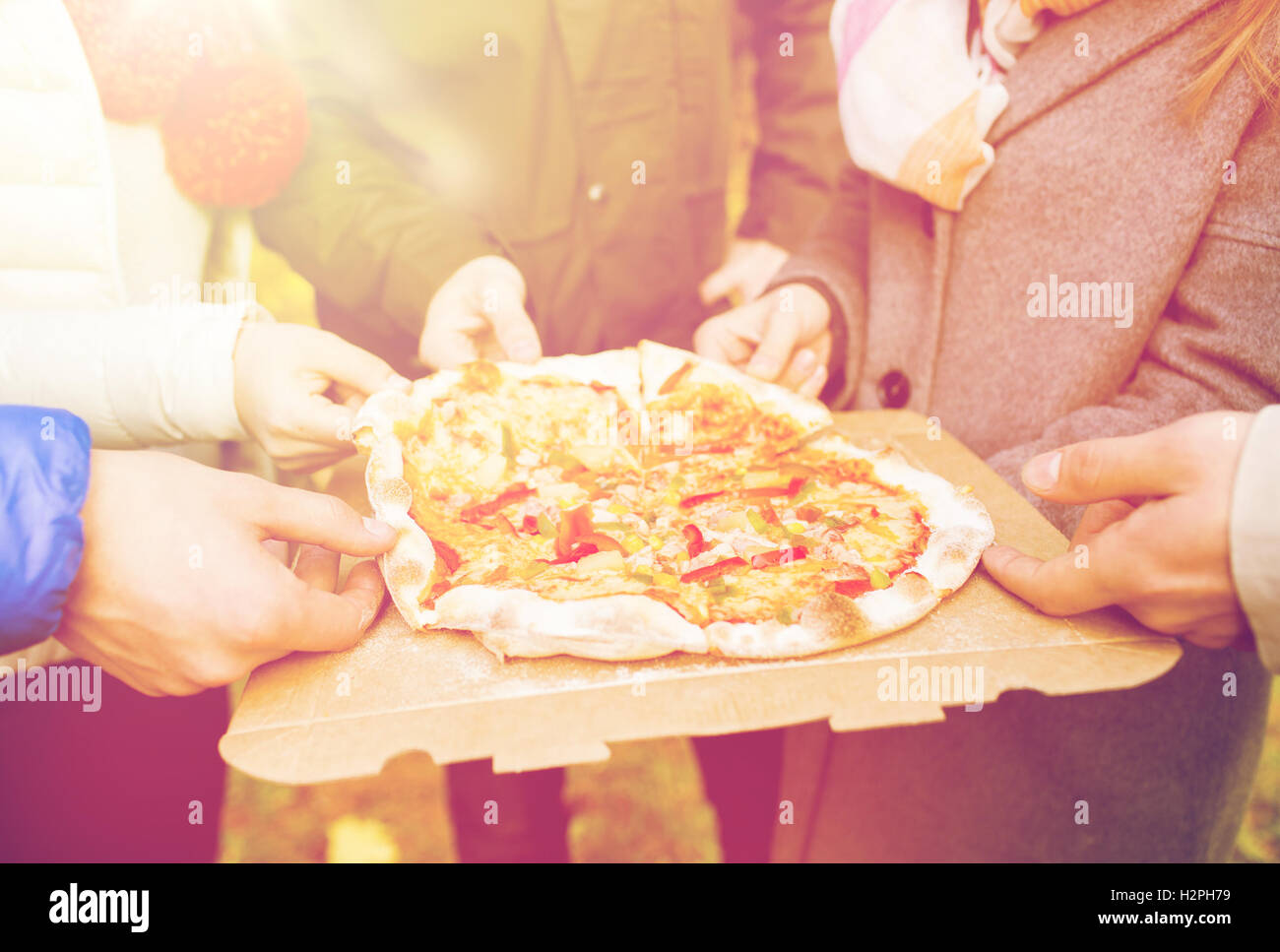 Share pizza and hands hi-res stock photography and images - Alamy