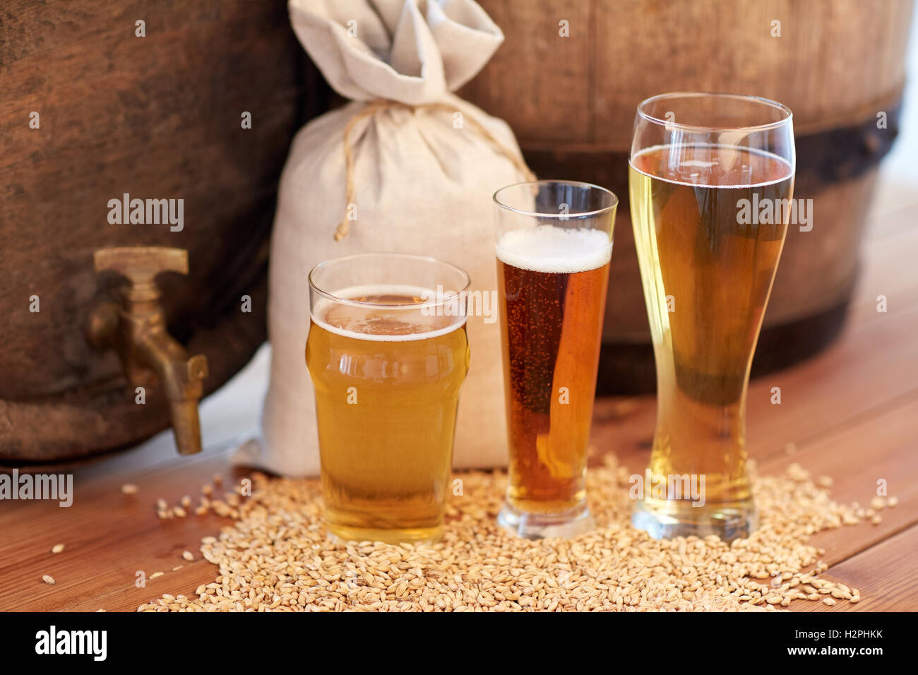 close up of beer barrel, glasses and bag with malt Stock Photo - Alamy