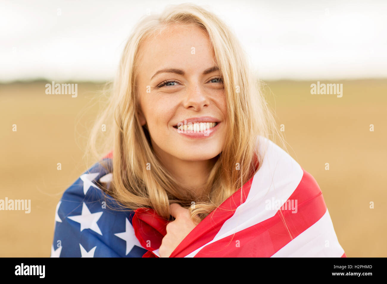 Girl wrapped in american flag hi-res stock photography and images - Alamy