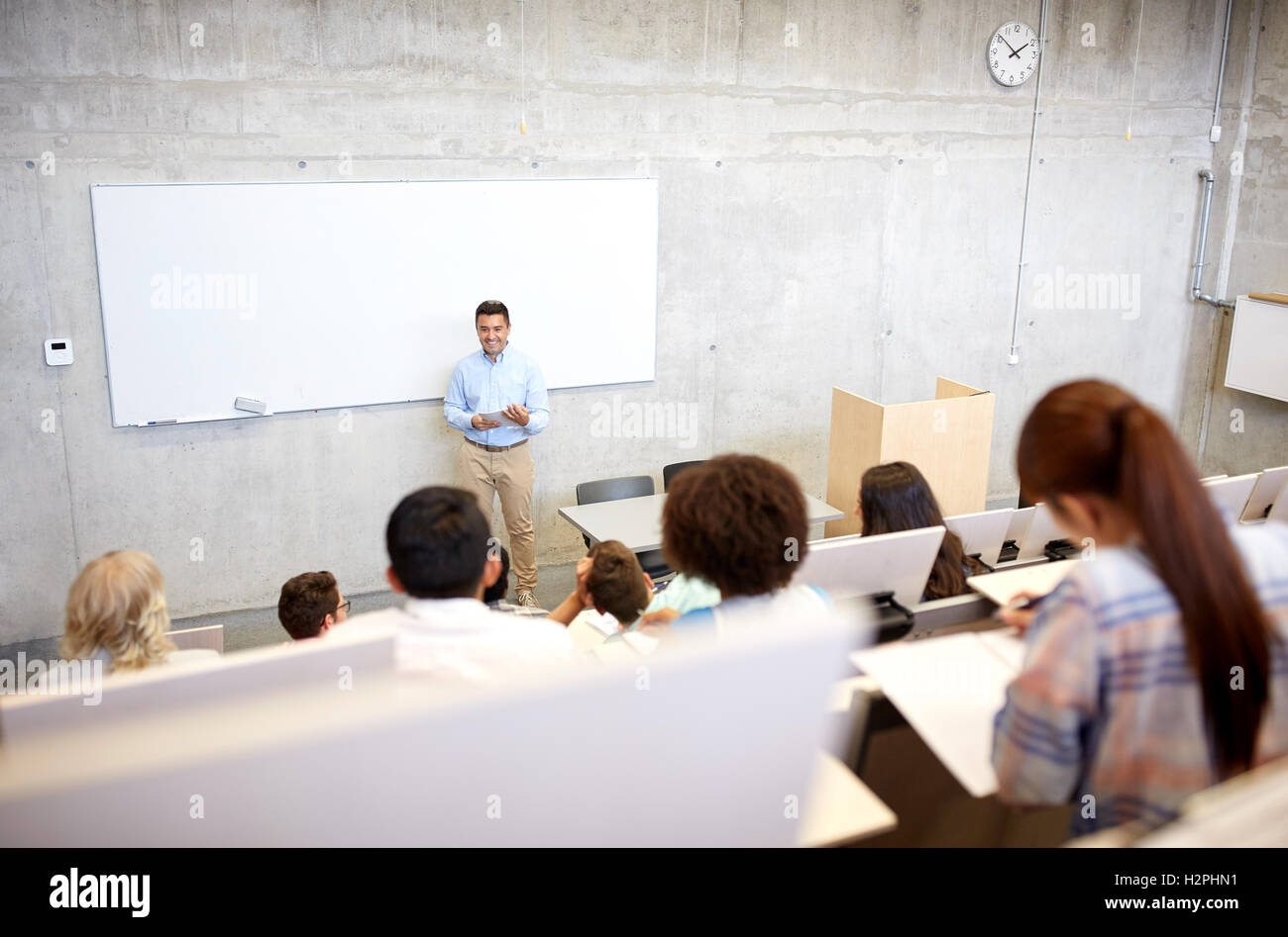 group of students and teacher at lecture Stock Photo - Alamy