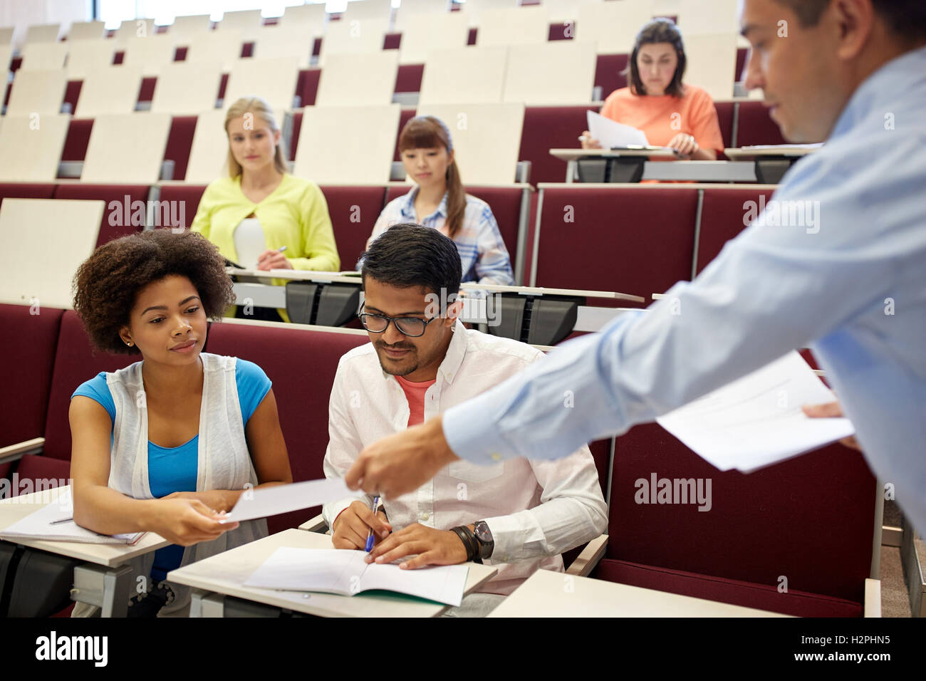 Multiethnic students taking test hi-res stock photography and images ...