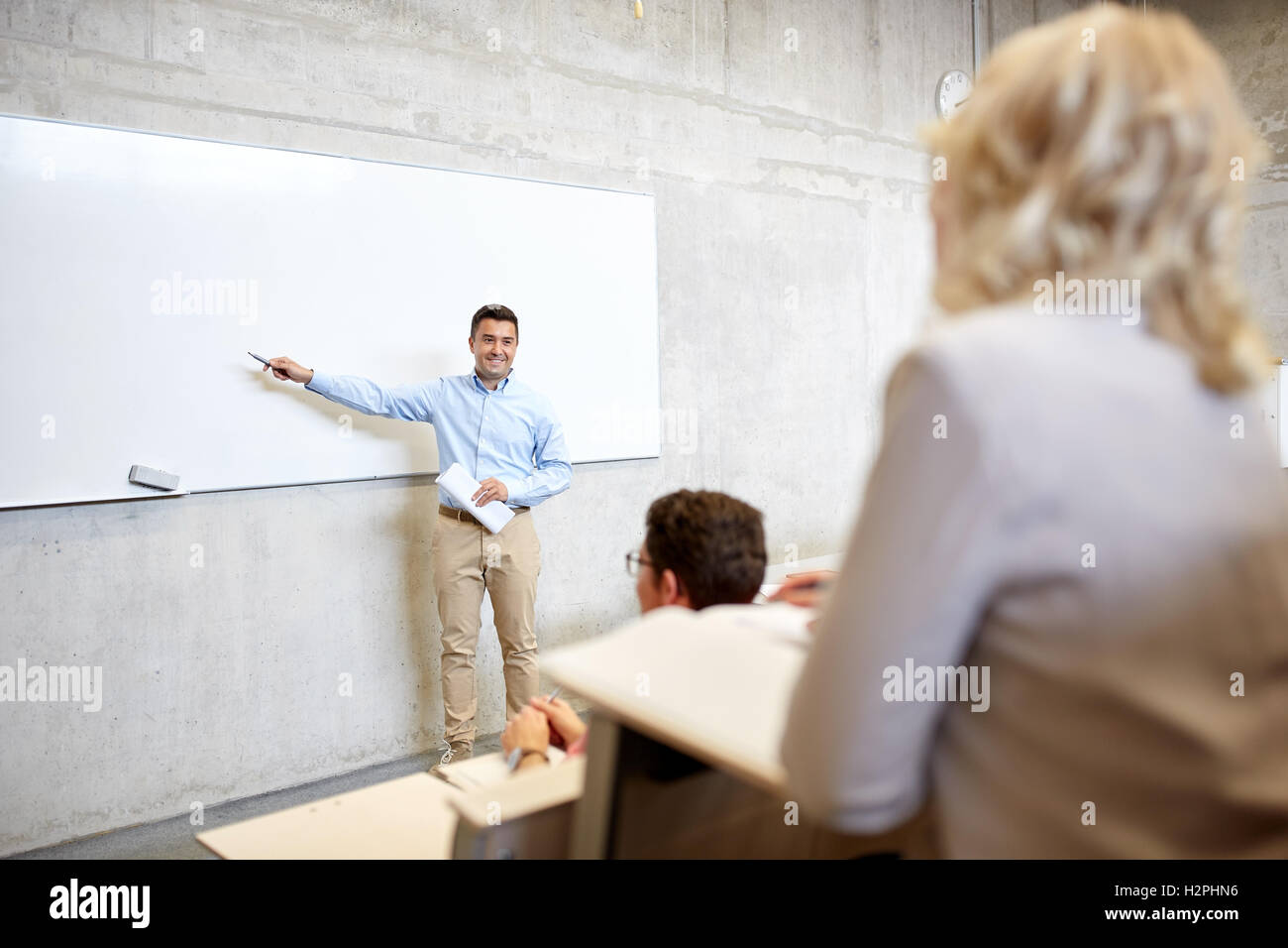 group of students and teacher at lecture Stock Photo - Alamy