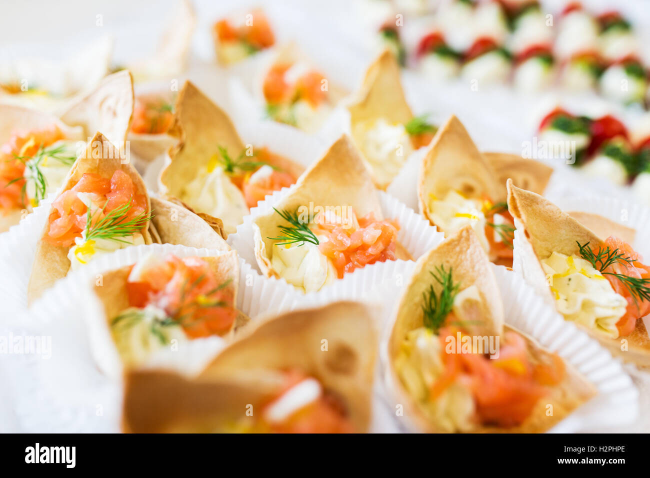 close up of dough cornet with salmon fish filling Stock Photo - Alamy