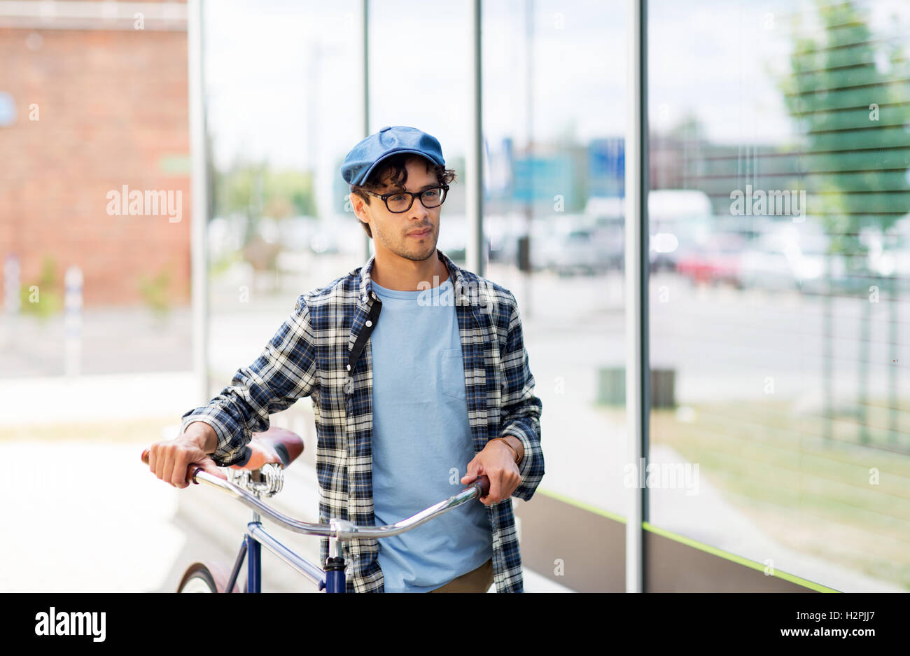 Man walking with bike hi-res stock photography and images - Alamy