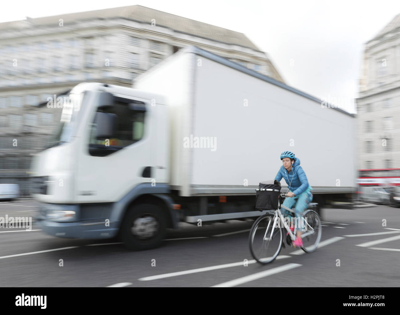 Cyclist lorry travel roundabout in westminster hi-res stock photography ...