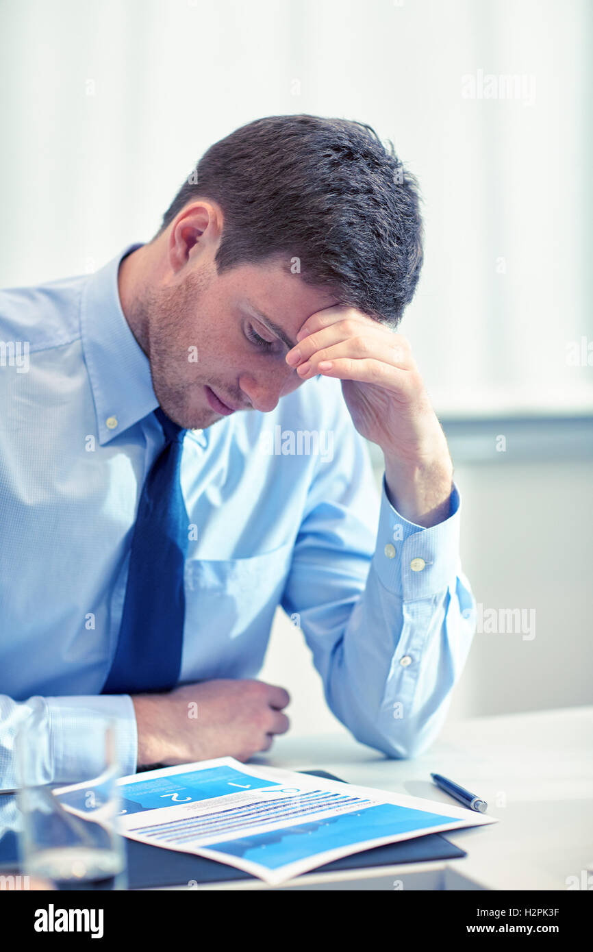 businessman having problem in office Stock Photo - Alamy