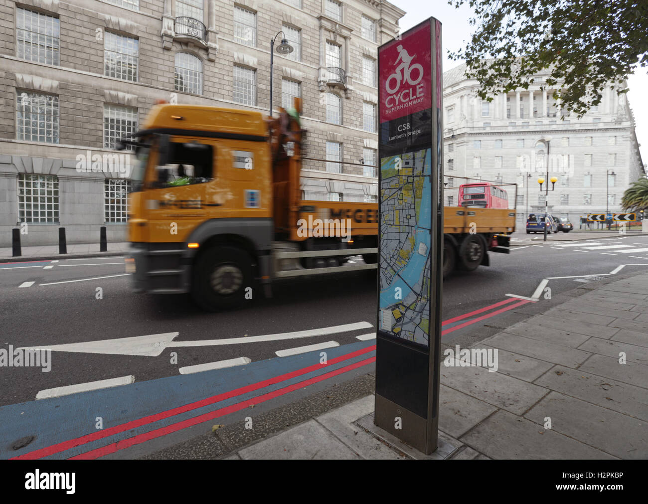 A lorry passes Cycle Superhighway sign along Milbank in Westminster ...