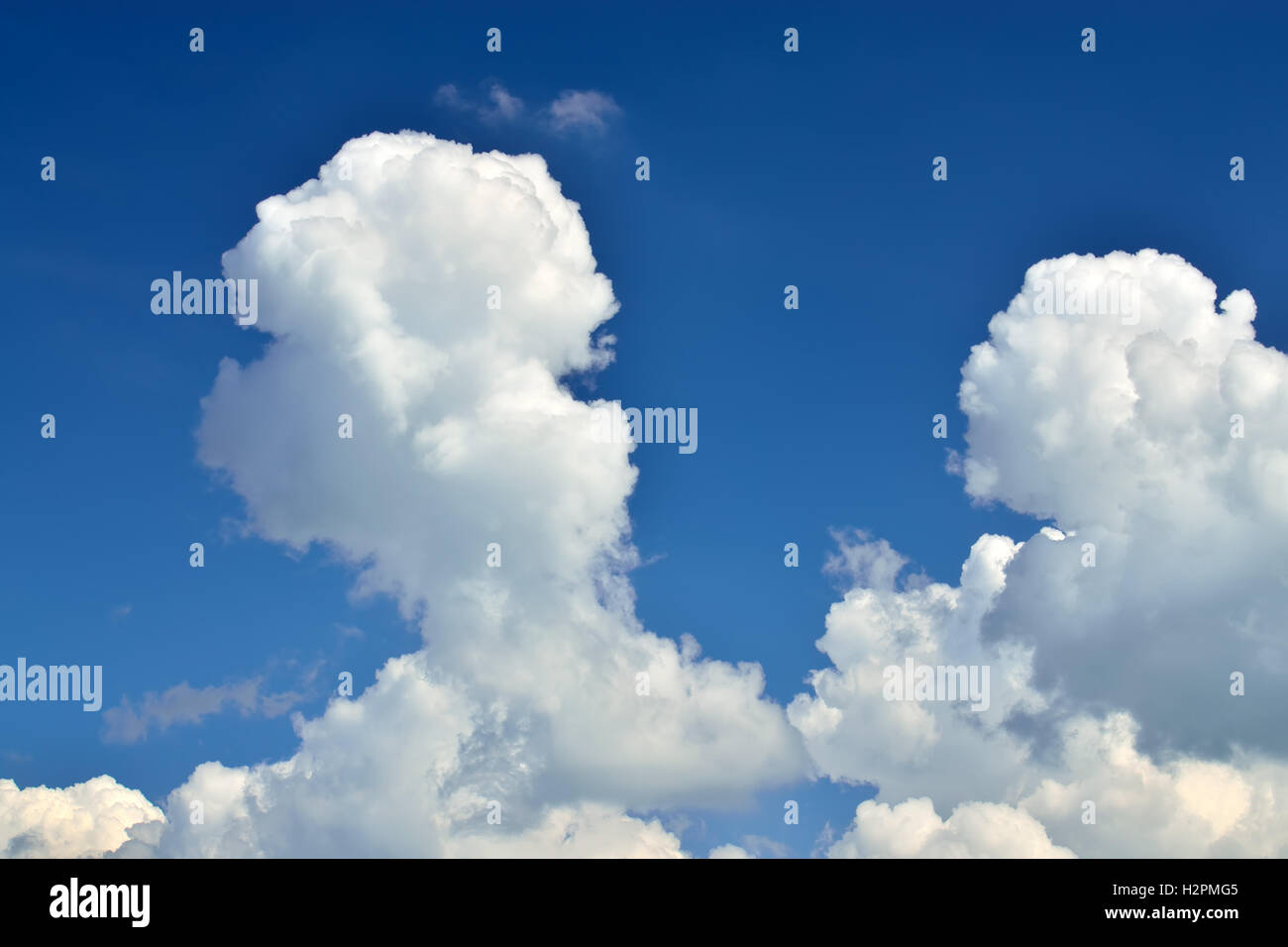 White Cumulus clouds against blue sky closeup Stock Photo - Alamy