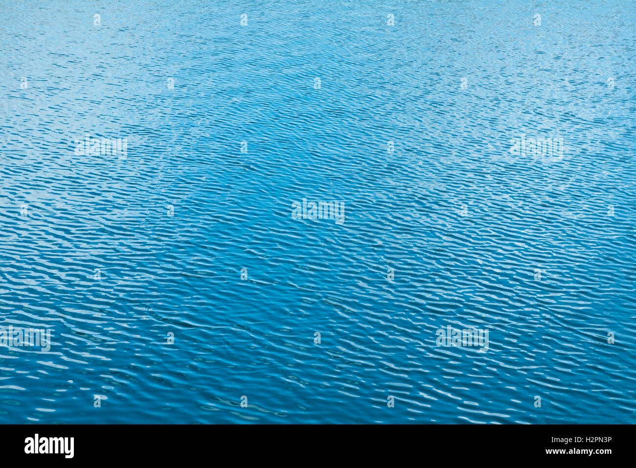Texture of clear blue water Stock Photo - Alamy