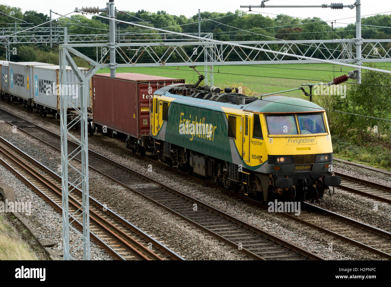 Class 90 electric locomotive pulling a freightliner train on the West ...