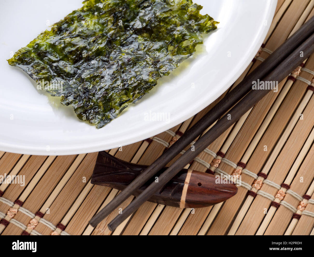Nori seaweed on the white plate Stock Photo - Alamy