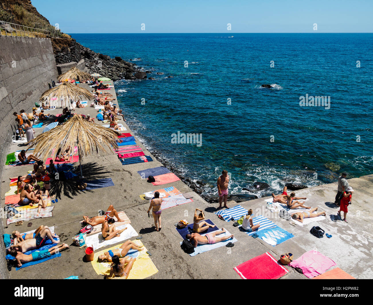 People enjoy the summer weather going swimming in the atlantic ocean at ...
