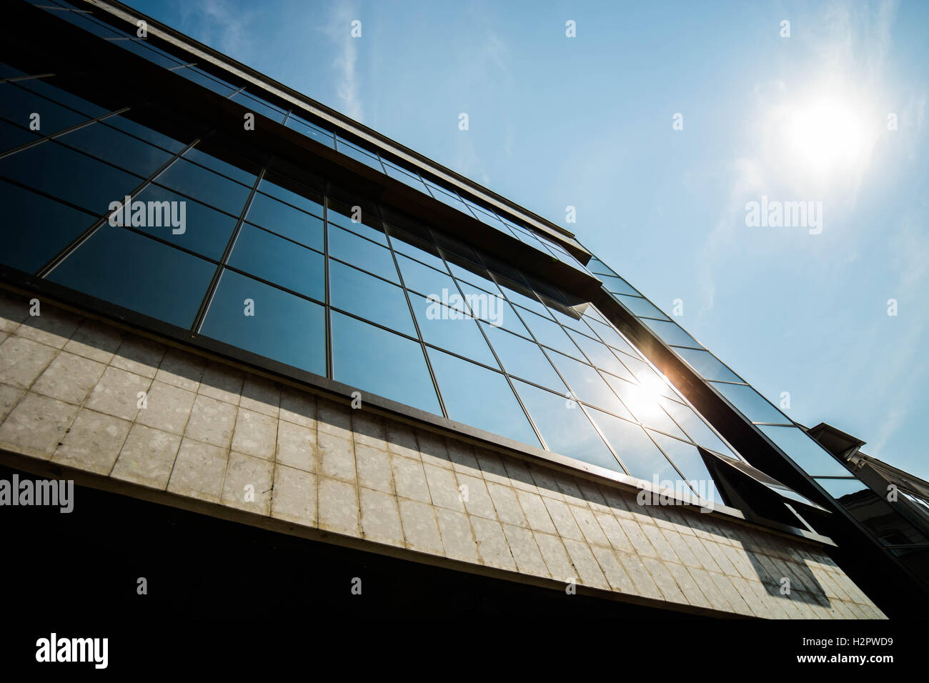 Tall building raising up to the blue sky. Architectural building Stock ...