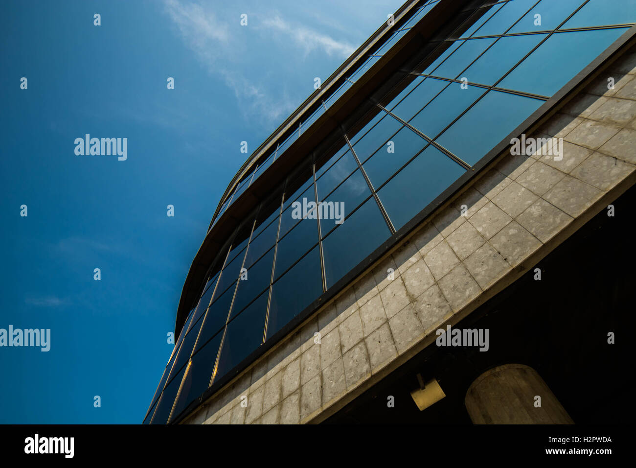 Tall building raising up to the blue sky. Architectural building Stock ...