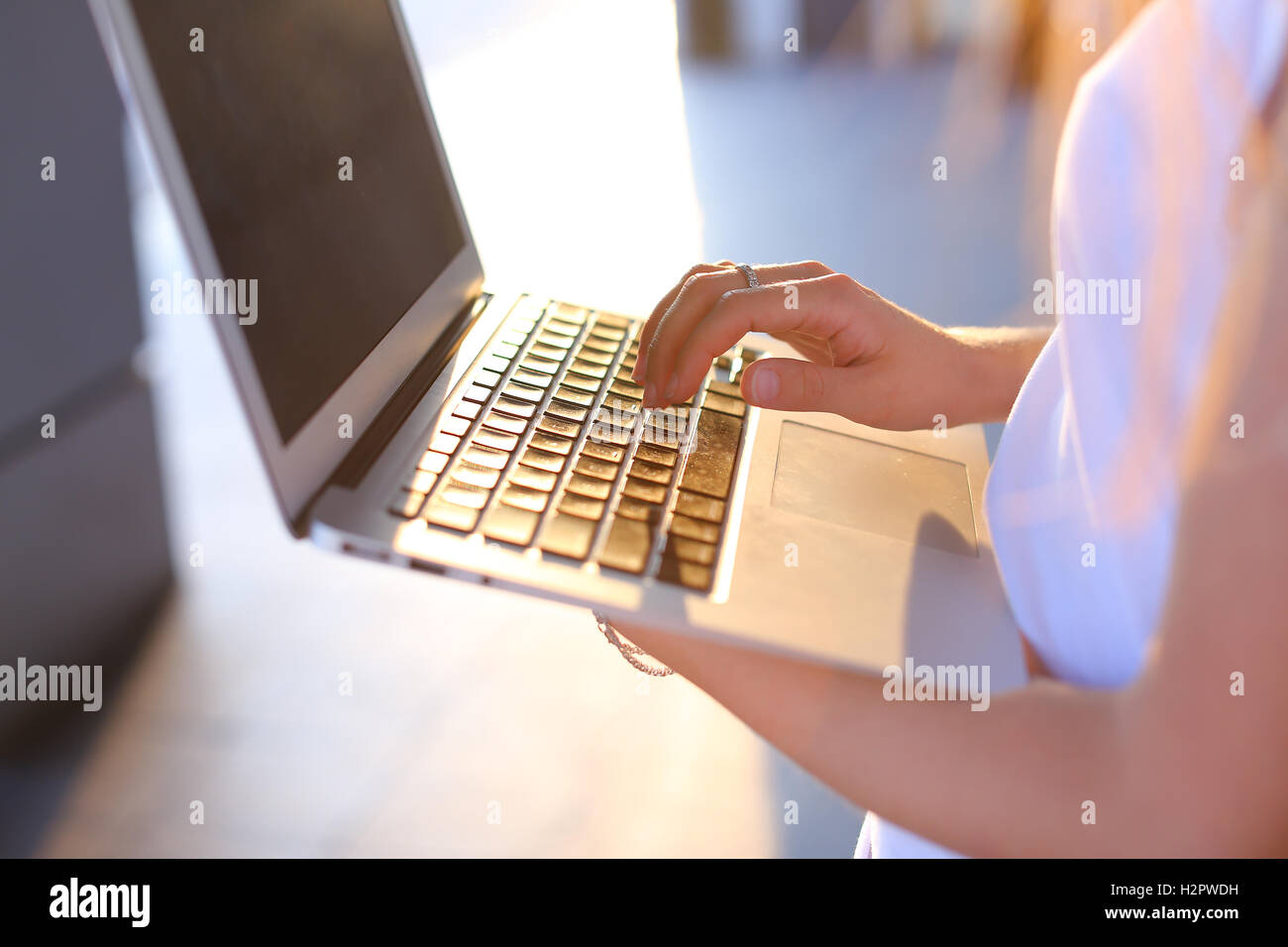 Hand lady press tauchpad keyboard on laptop. Young beautiful female ...